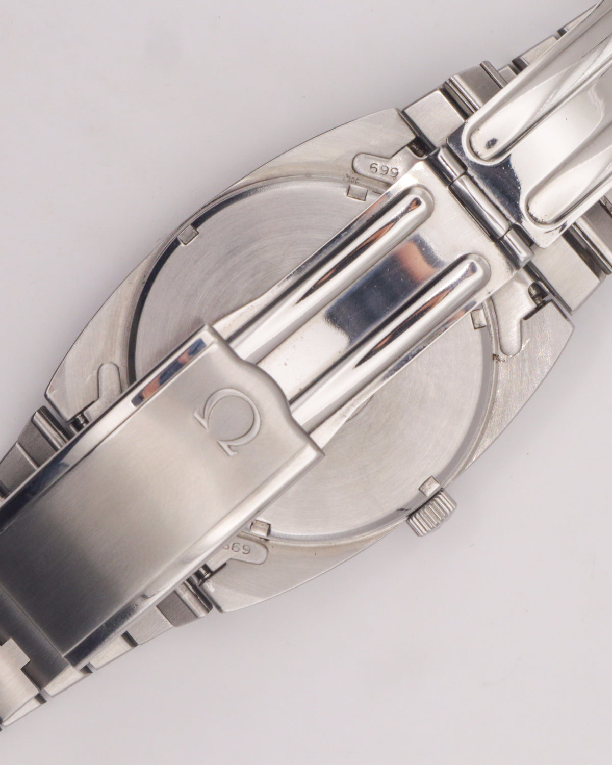 Omega Genève | The Revolver Club