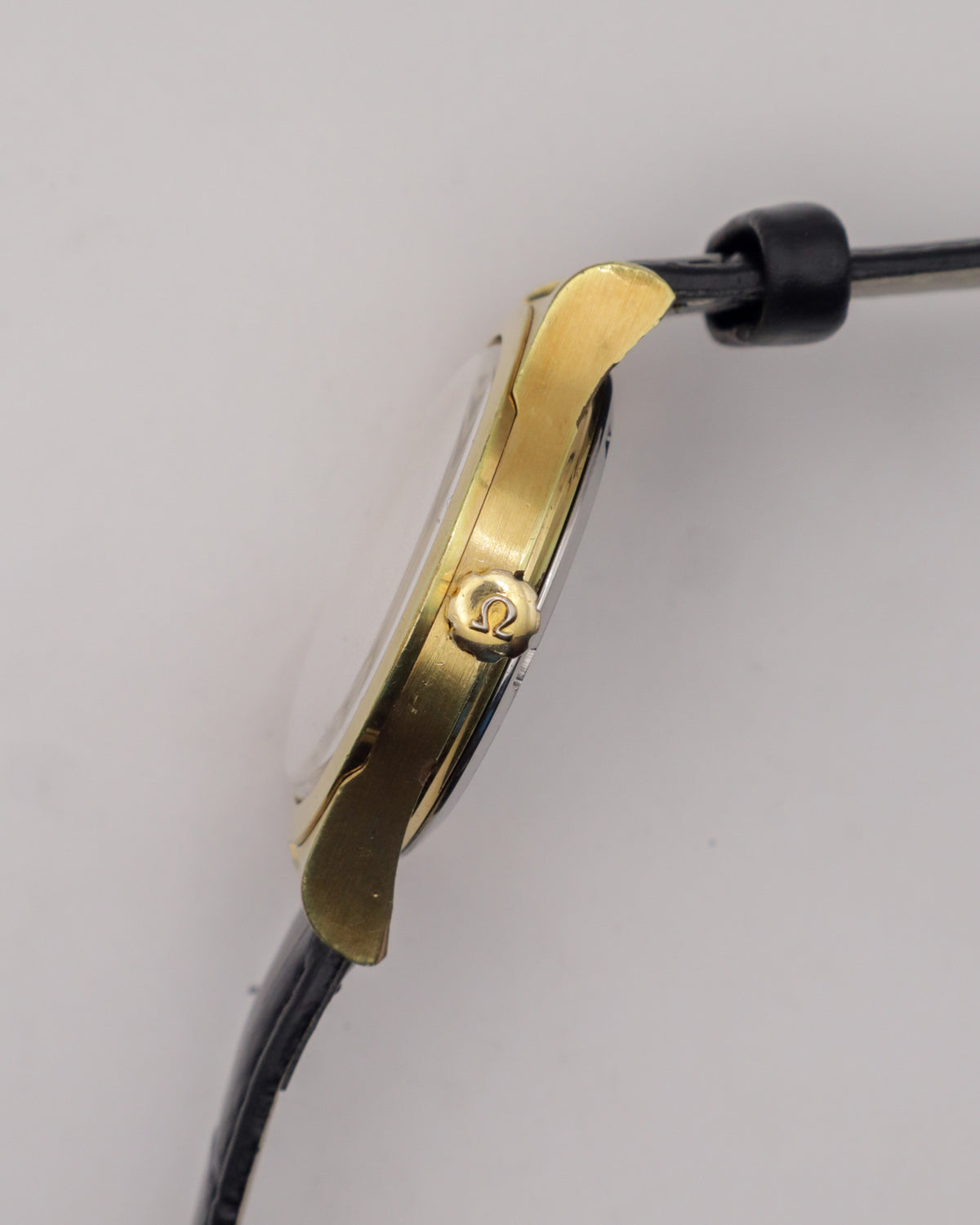 Omega Genève | The Revolver Club